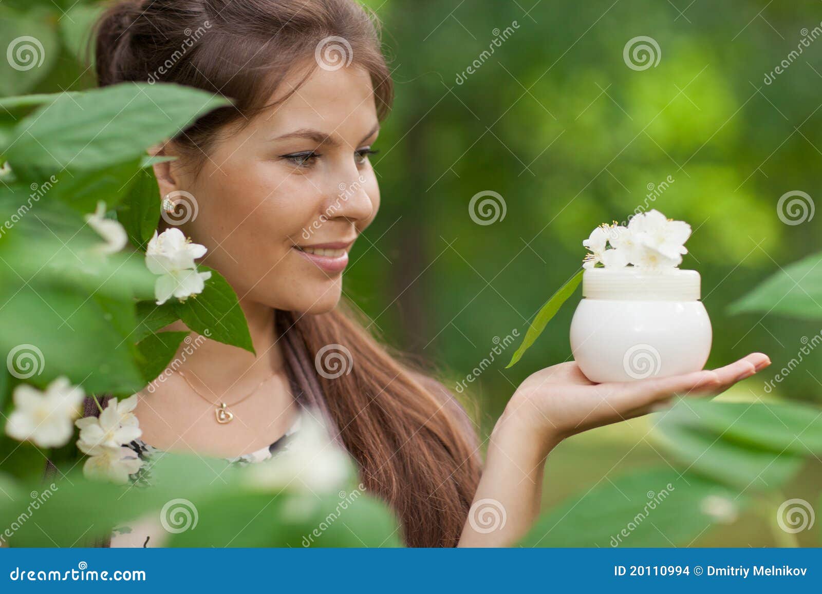 Young Beautiful Woman with Cosmetic Cream Stock Photo - Image of flower ...