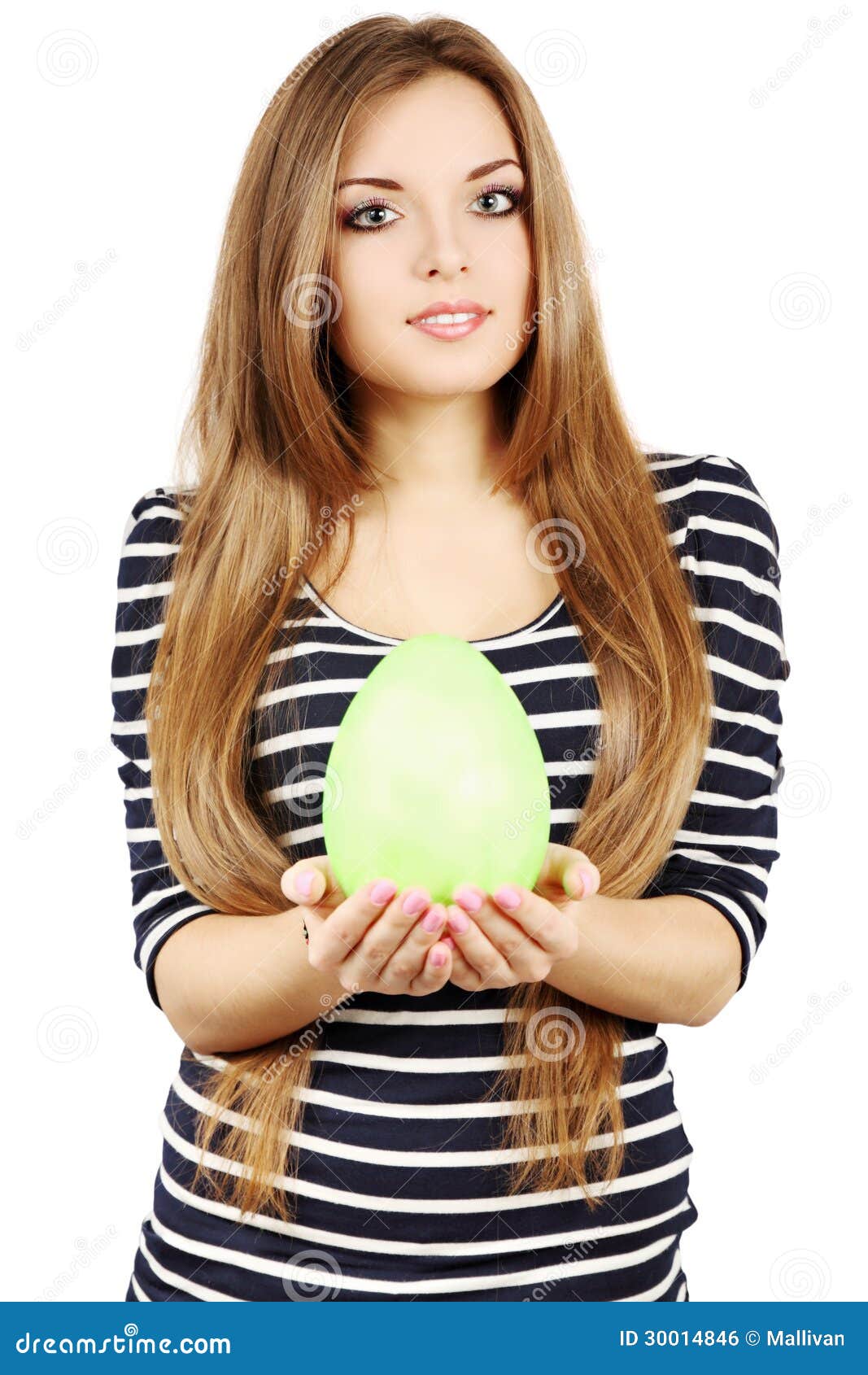 Woman holds a green egg stock photo. Image of hand, evening - 30014846