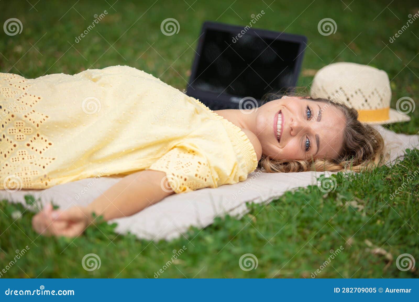 Young Beautiful Woman Laying on Grass Stock Image - Image of summer ...