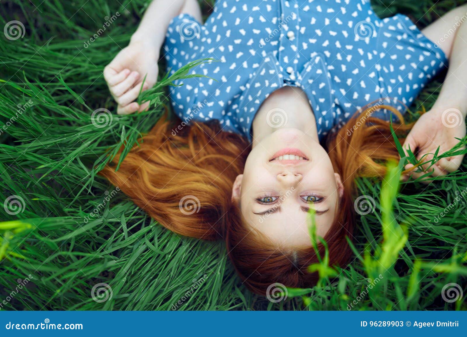 Young Beautiful Woman Lies In The Grass In The Field Summer Stock