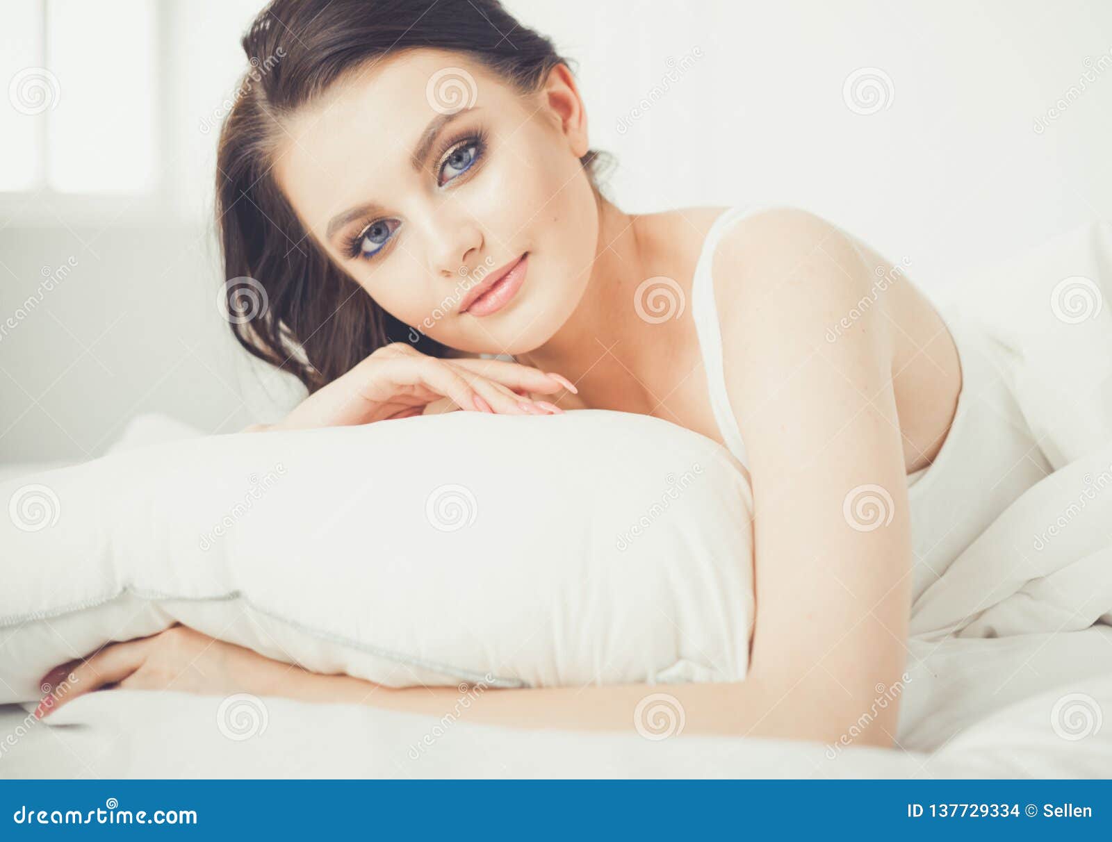 Young Beautiful Woman Lying in Bed. Stock Photo - Image of female ...