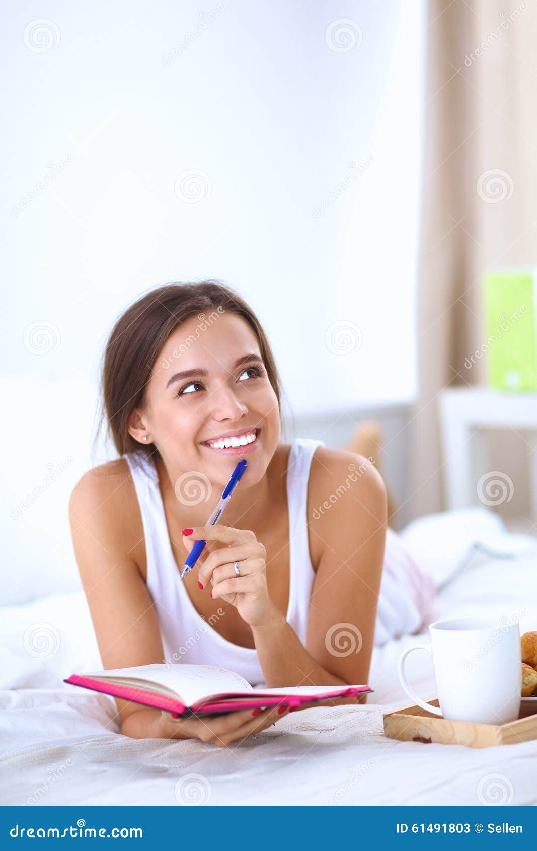 Young Beautiful Woman Lying In Bed Writing A Diary Stock Image Image