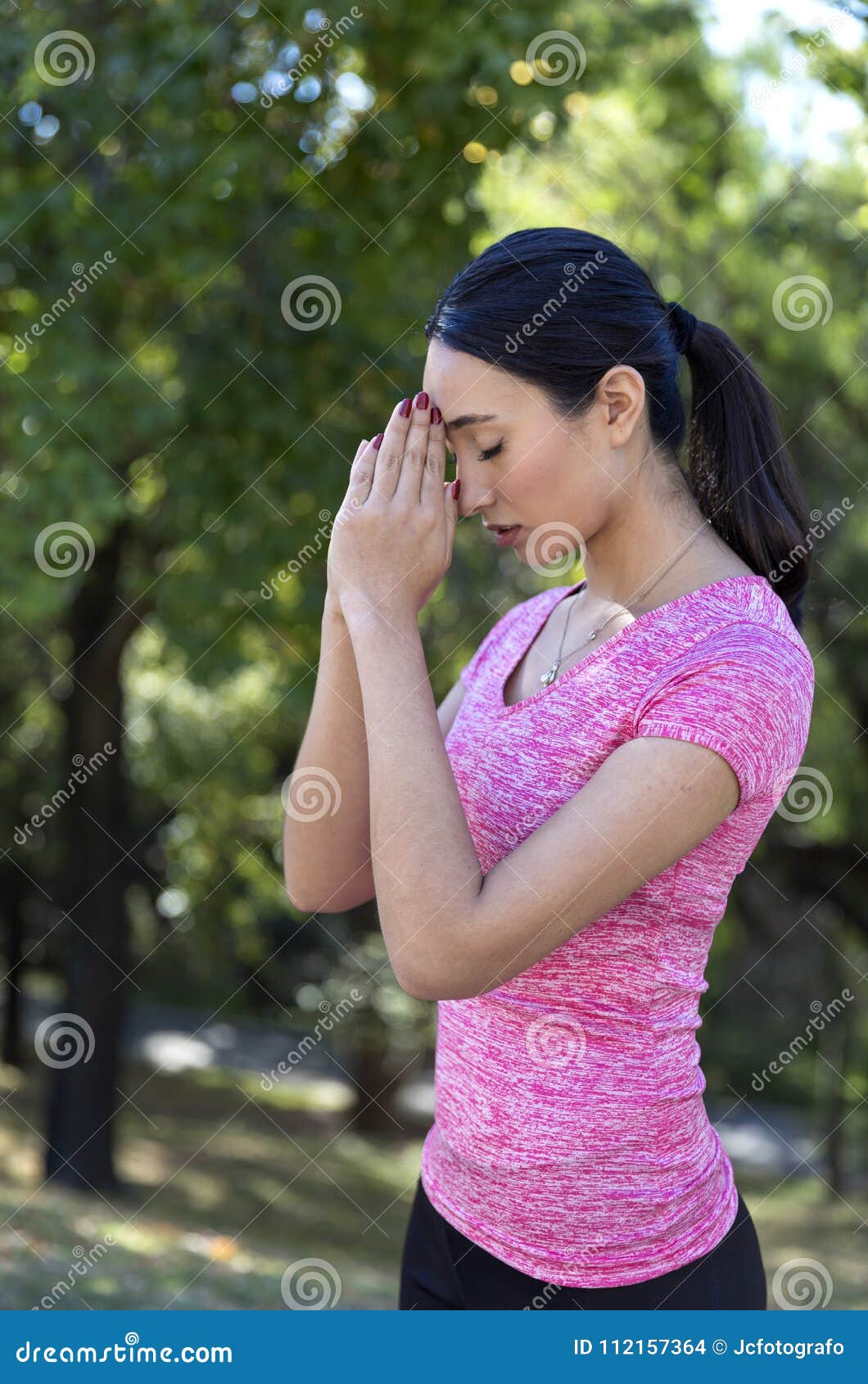 Young Woman Praying before Exercising Stock Photo - Image of morning ...