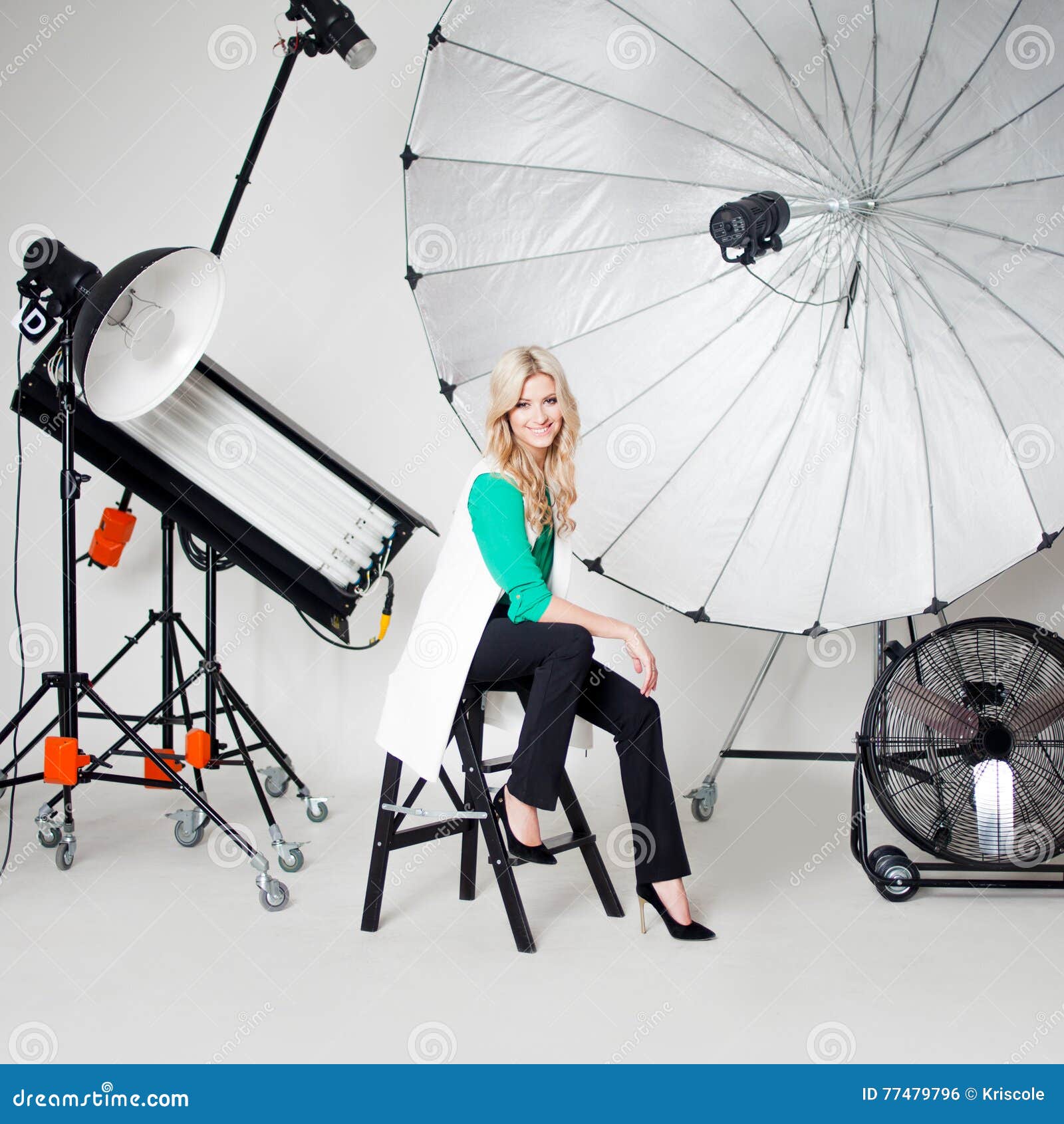 Young Beautiful Woman in Studio, Lighting Spotlights on the Background ...