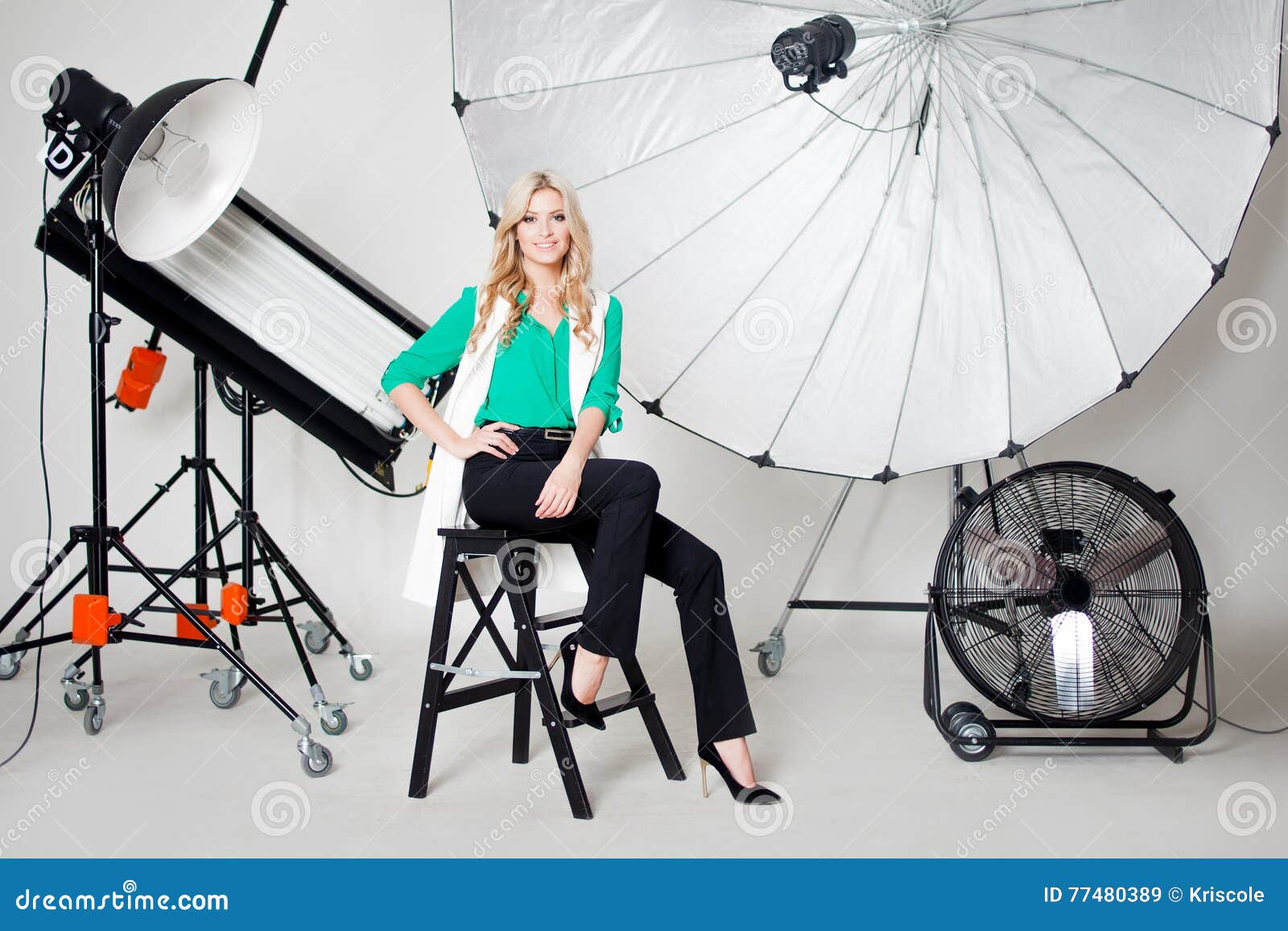 Young Beautiful Woman in Studio, Lighting Spotlights on the Background ...