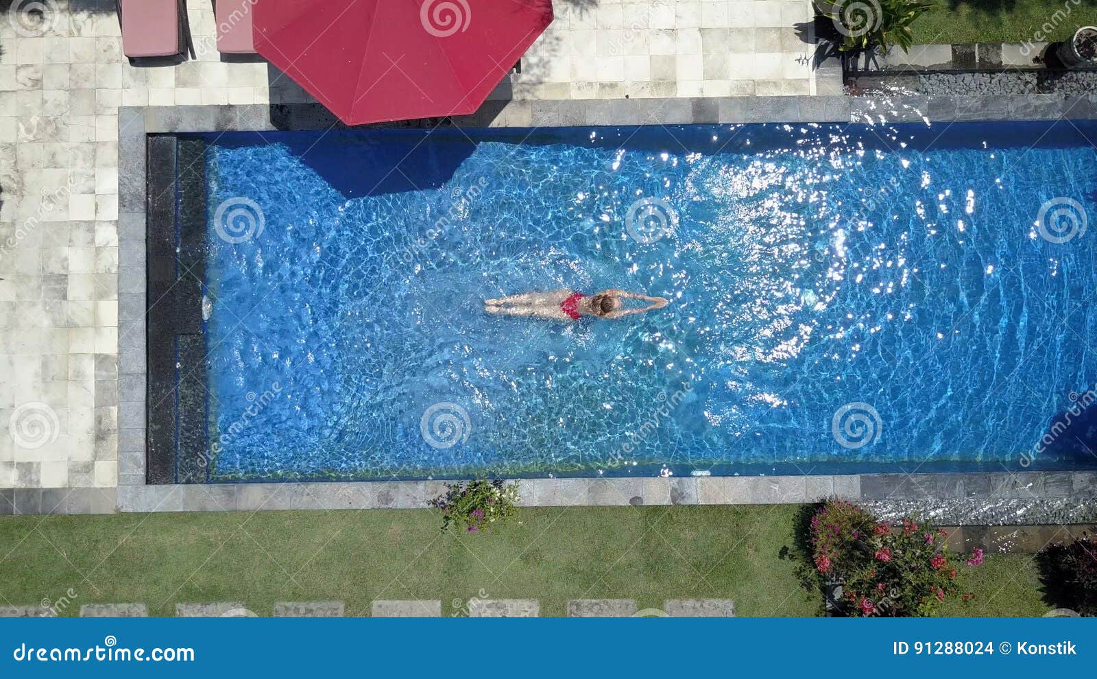 Young Beautiful Woman Swims in the Pool, Flat Lay, Dron View. Stock ...