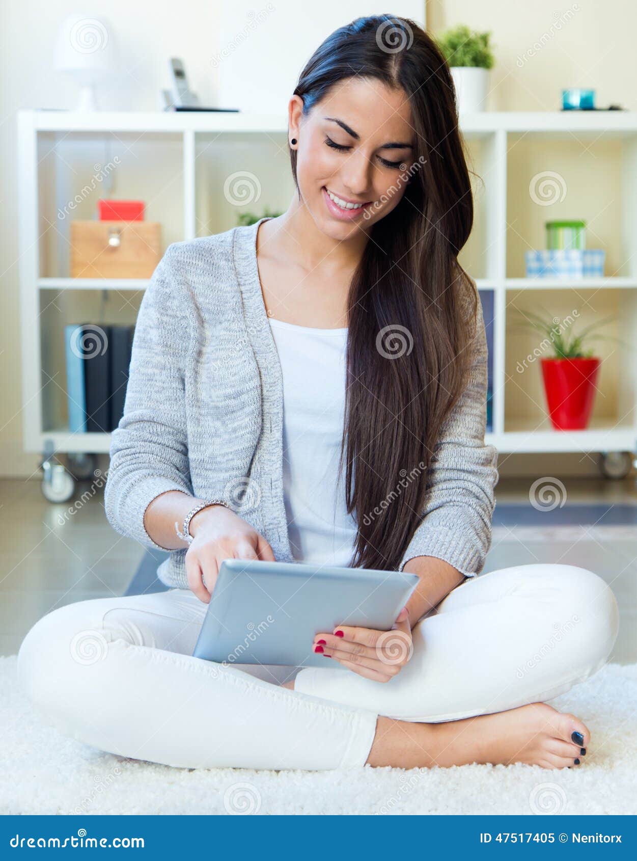 Young Beautiful Woman Using Her Digital Tablet at Home. Stock Image ...