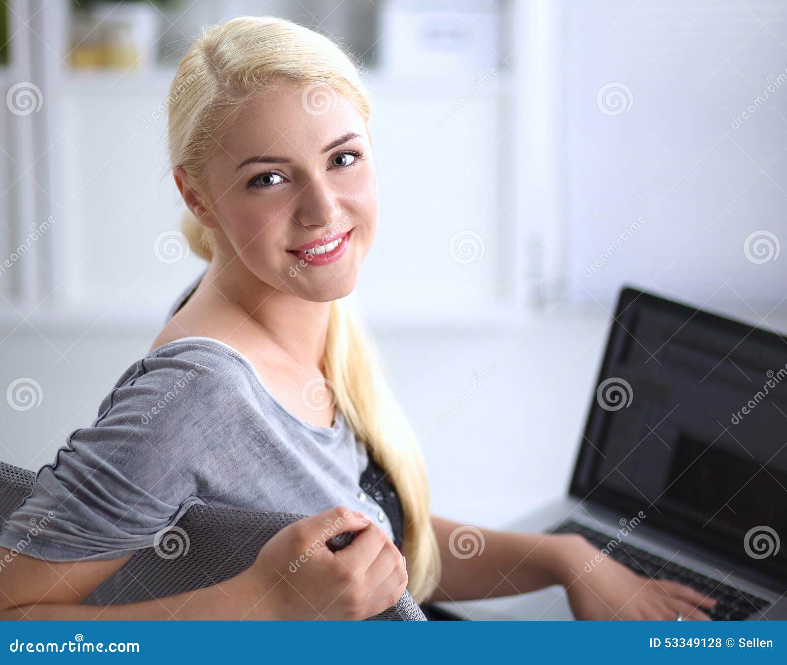 Young Beautiful Woman Using a Laptop Computer at Stock Photo - Image of ...