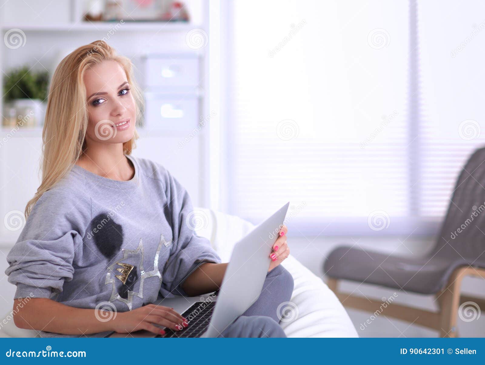 Young Beautiful Woman Using a Laptop Computer at Home Stock Image ...