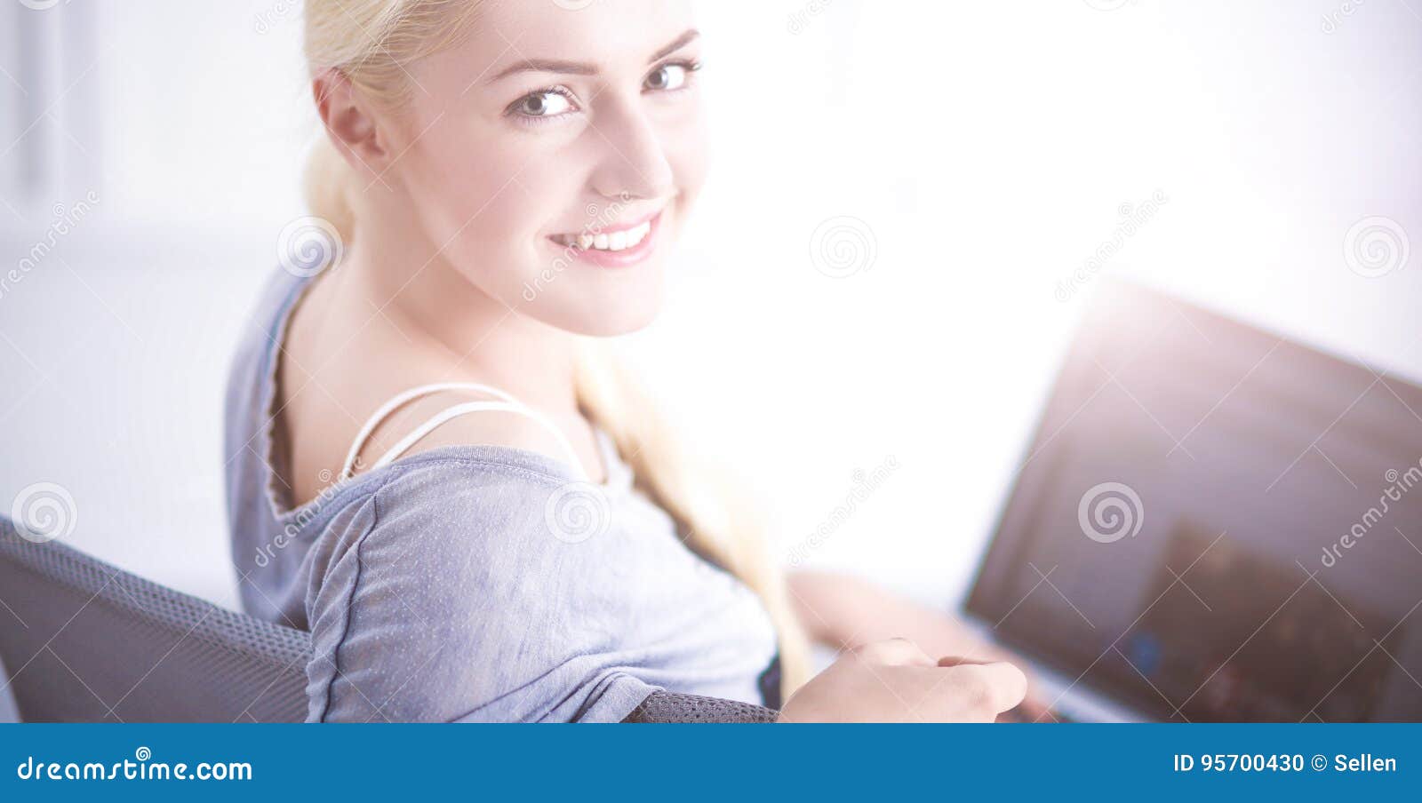 Young Beautiful Woman Using a Laptop Computer at Home Stock Photo ...
