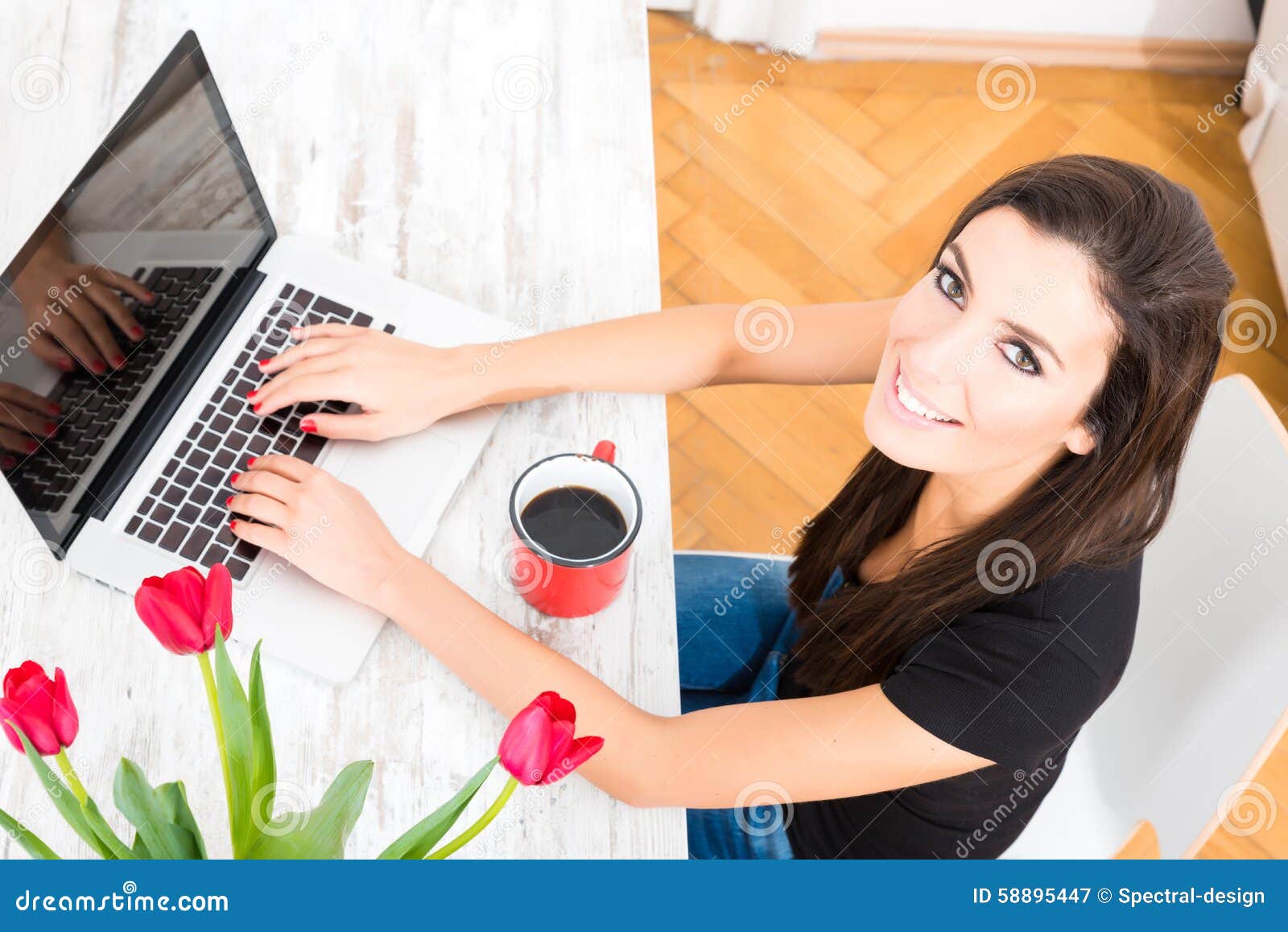 Young Beautiful Woman Using a Laptop at Home Stock Image - Image of ...