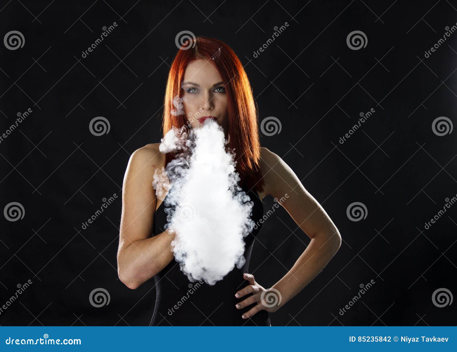 Young Beautiful Woman Vaping E-cigarette. Stock Photo - Image of ...
