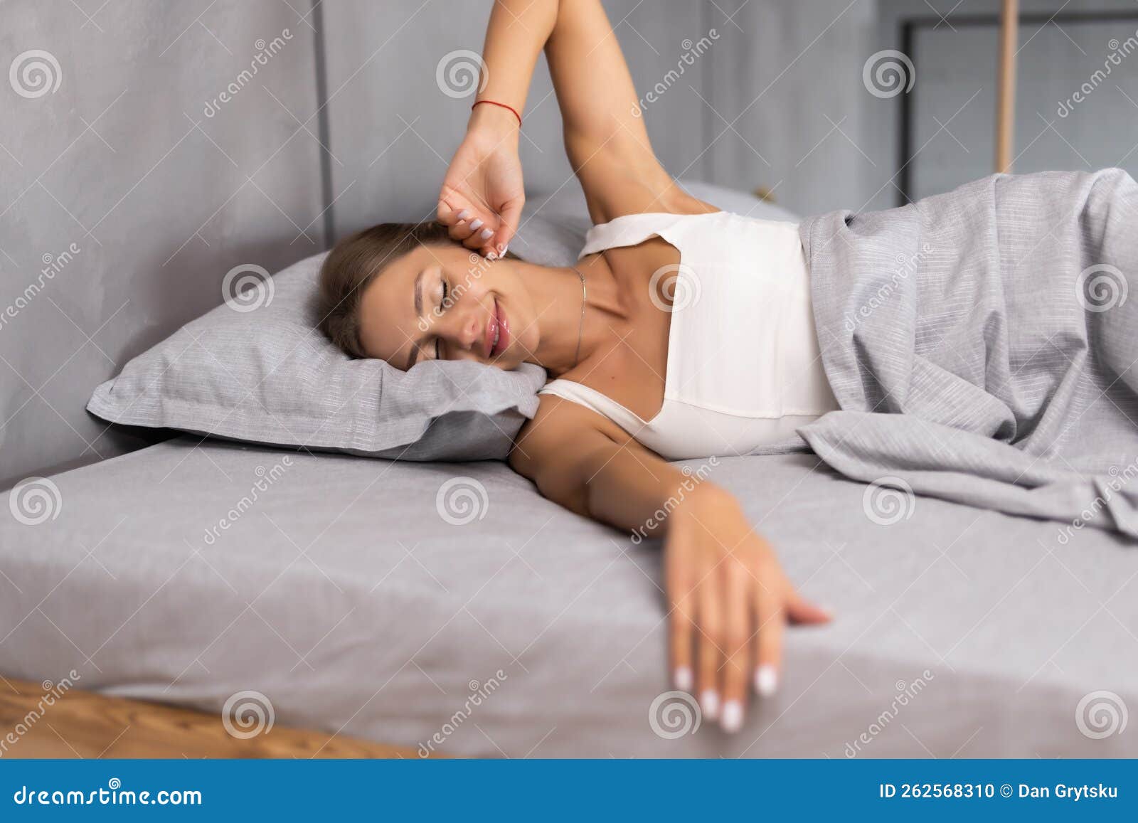 Young Beautiful Woman Waking Up In Her Bed Fully Rested Woman