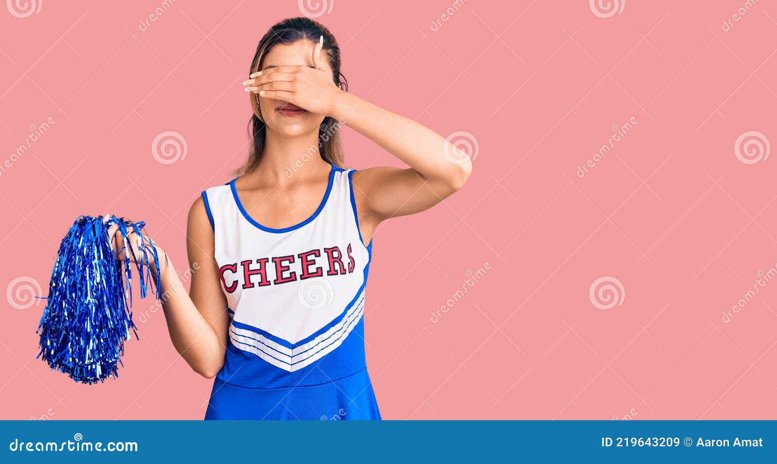 Young Beautiful Woman Wearing Cheerleader Uniform Smiling And Laughing