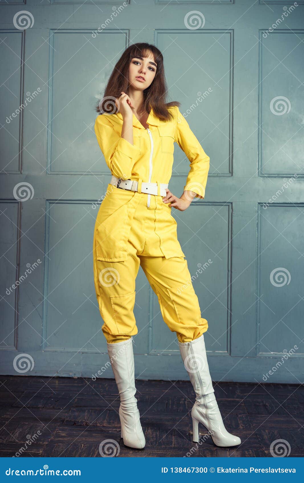 Young Beautiful Woman in Yellow Work Suit Stock Photo - Image of female ...