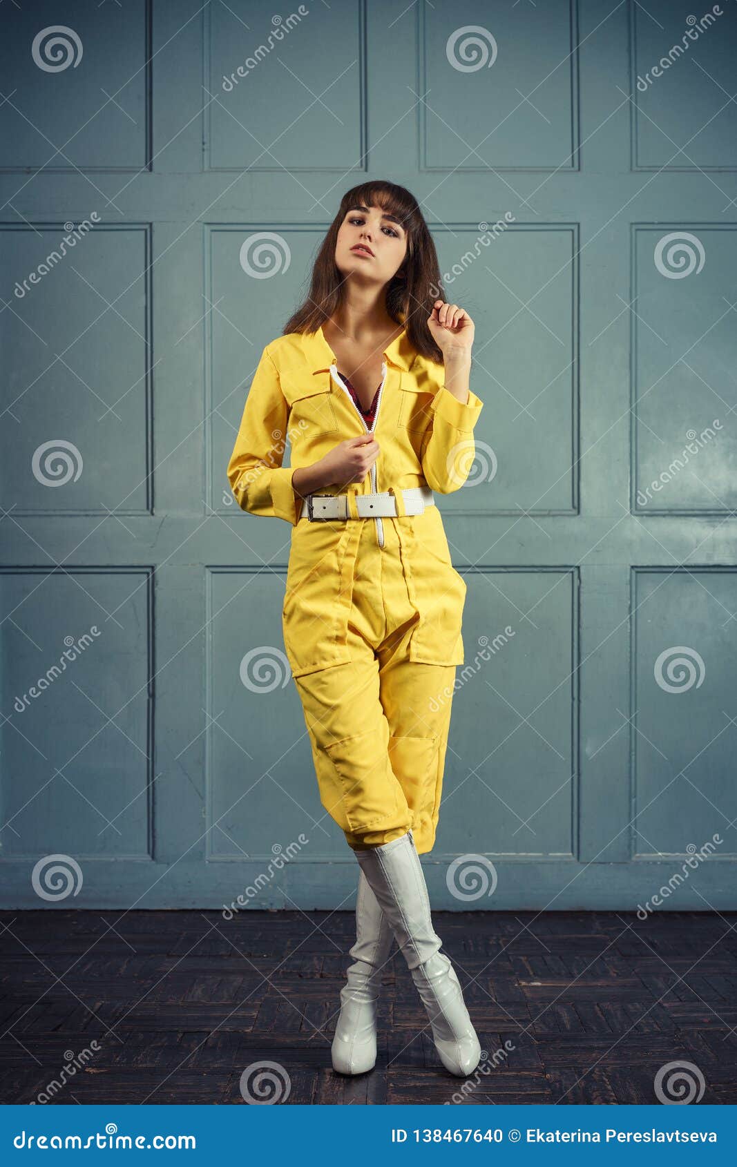Young Beautiful Woman in Yellow Work Suit Stock Photo - Image of people ...