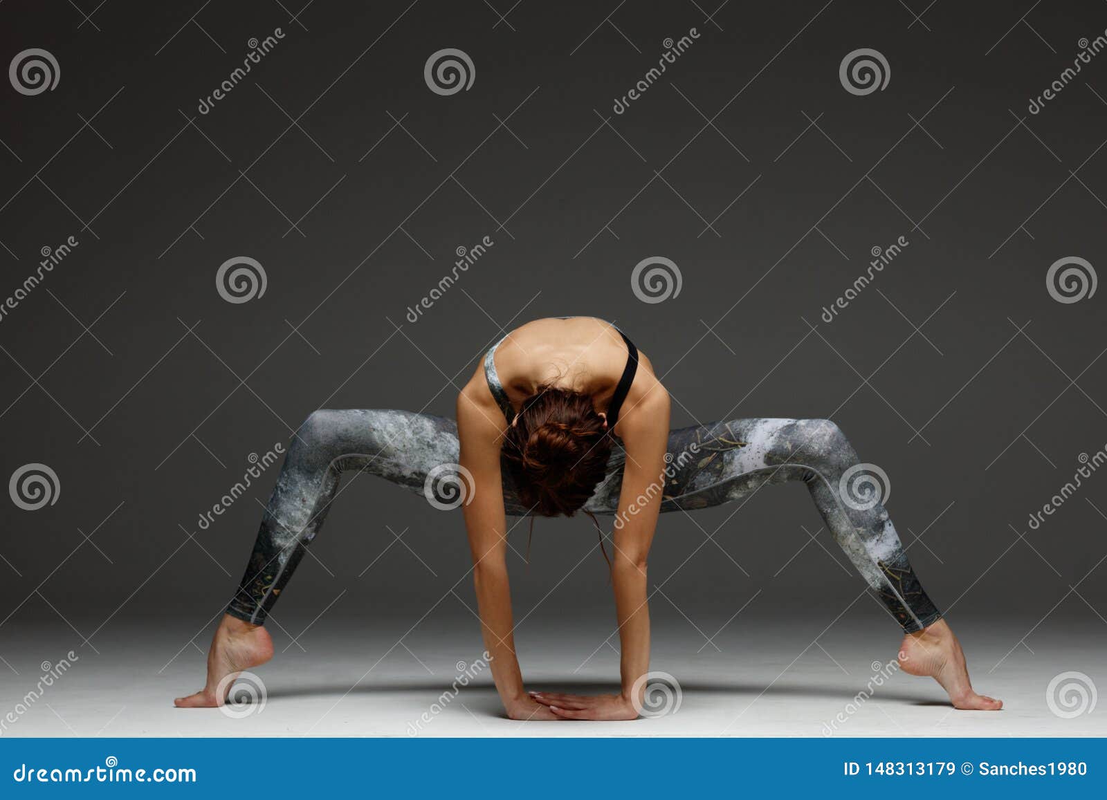 Young Beautiful Yoga Instructor is Posing in Studio. Stock Image ...