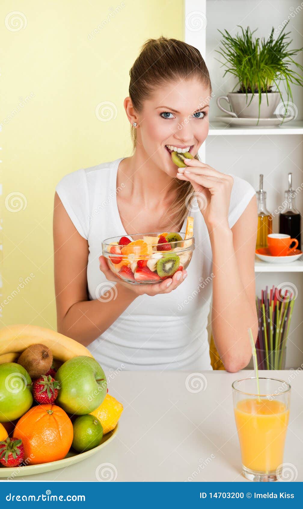 Woman Eating Fruit