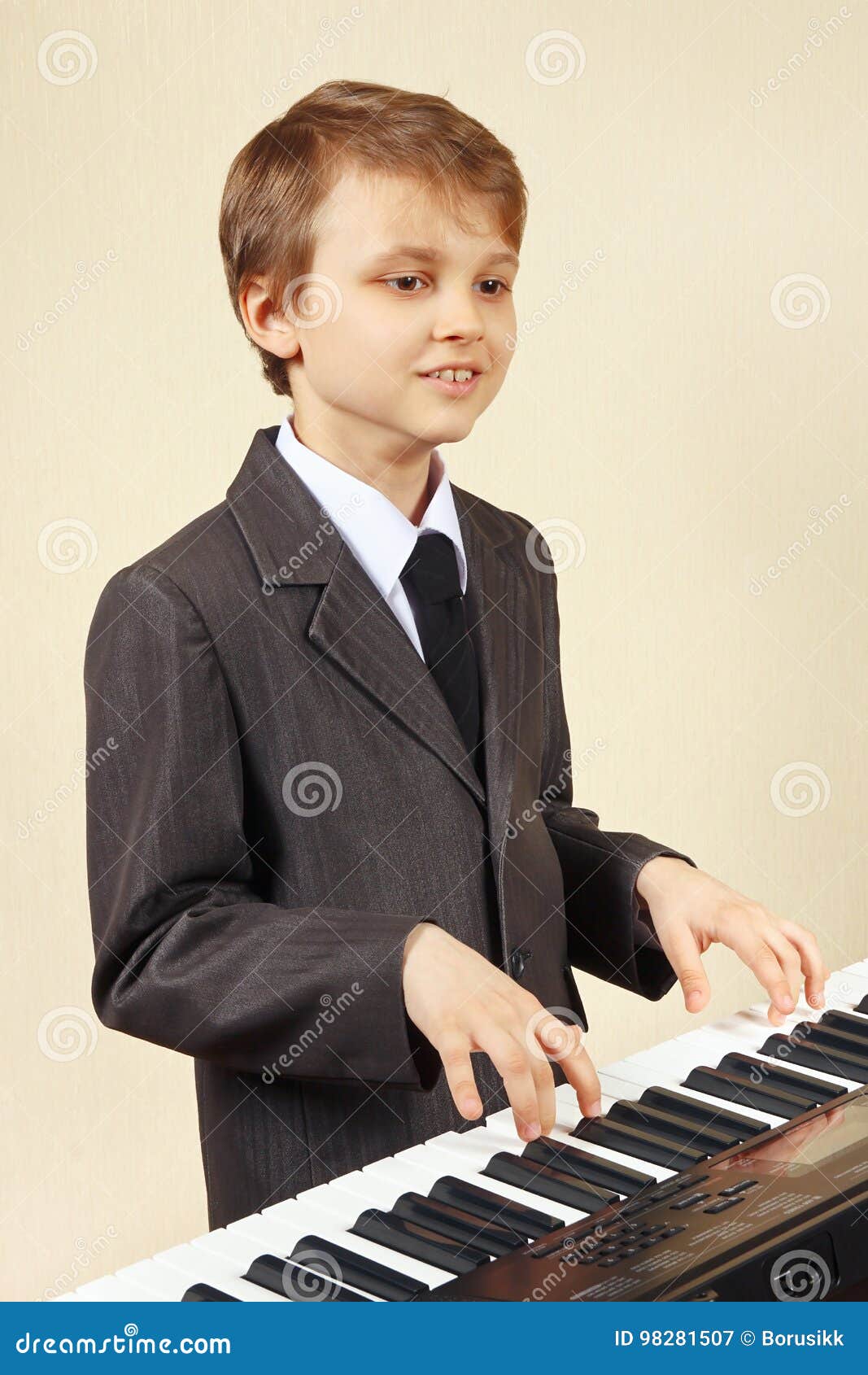 Young Beginner Musician in Suit Playing the Digital Piano Stock Image ...