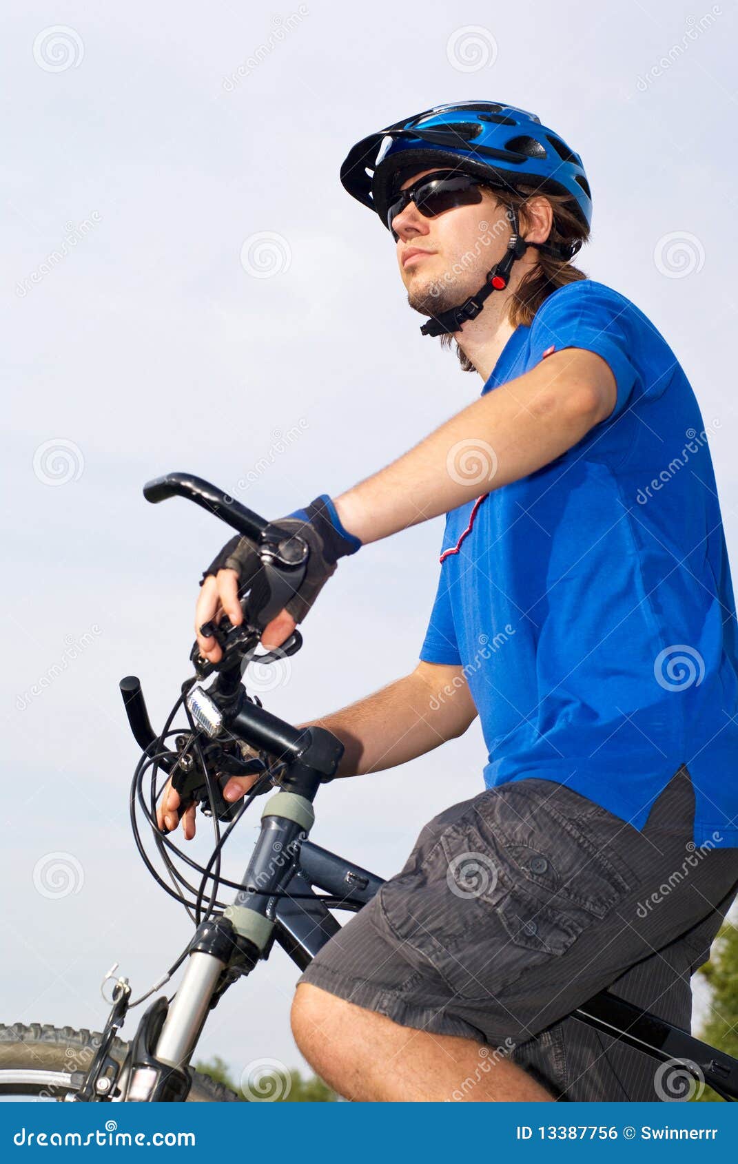 Young bicyclist in helmet stock photo. Image of pursuit - 13387756