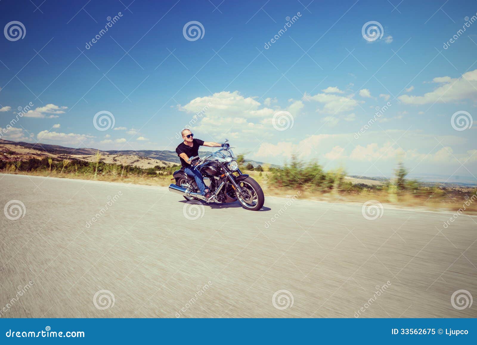 Young Biker Riding a Motorcycle on an Open Road Stock Image - Image of ...