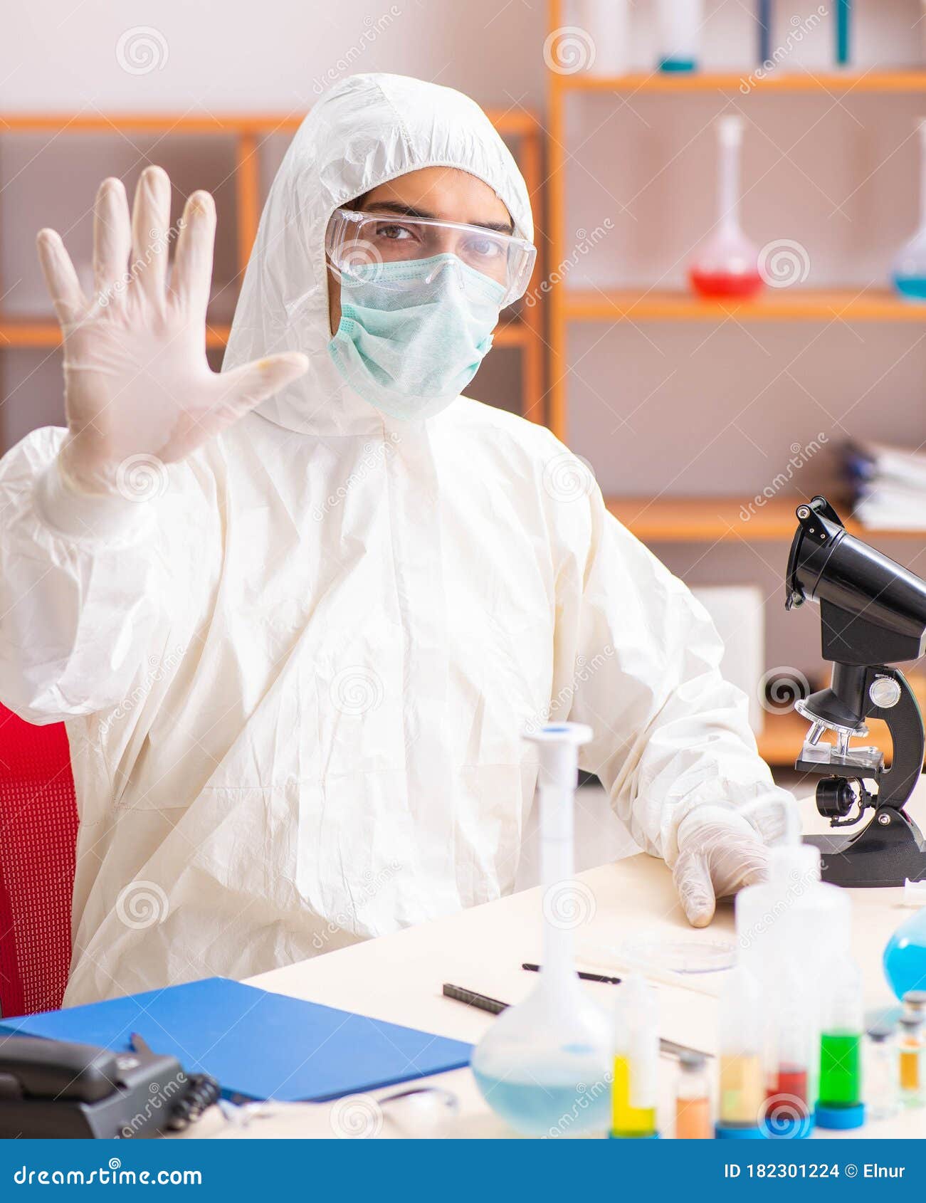 Young Biochemist Wearing Protective Suit Working in the Lab Stock Photo ...