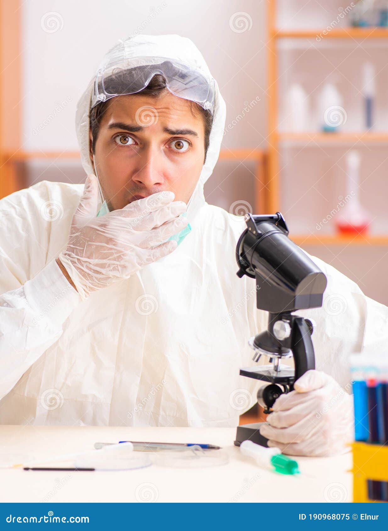 Young Biochemist Wearing Protective Suit Working in the Lab Stock Image ...