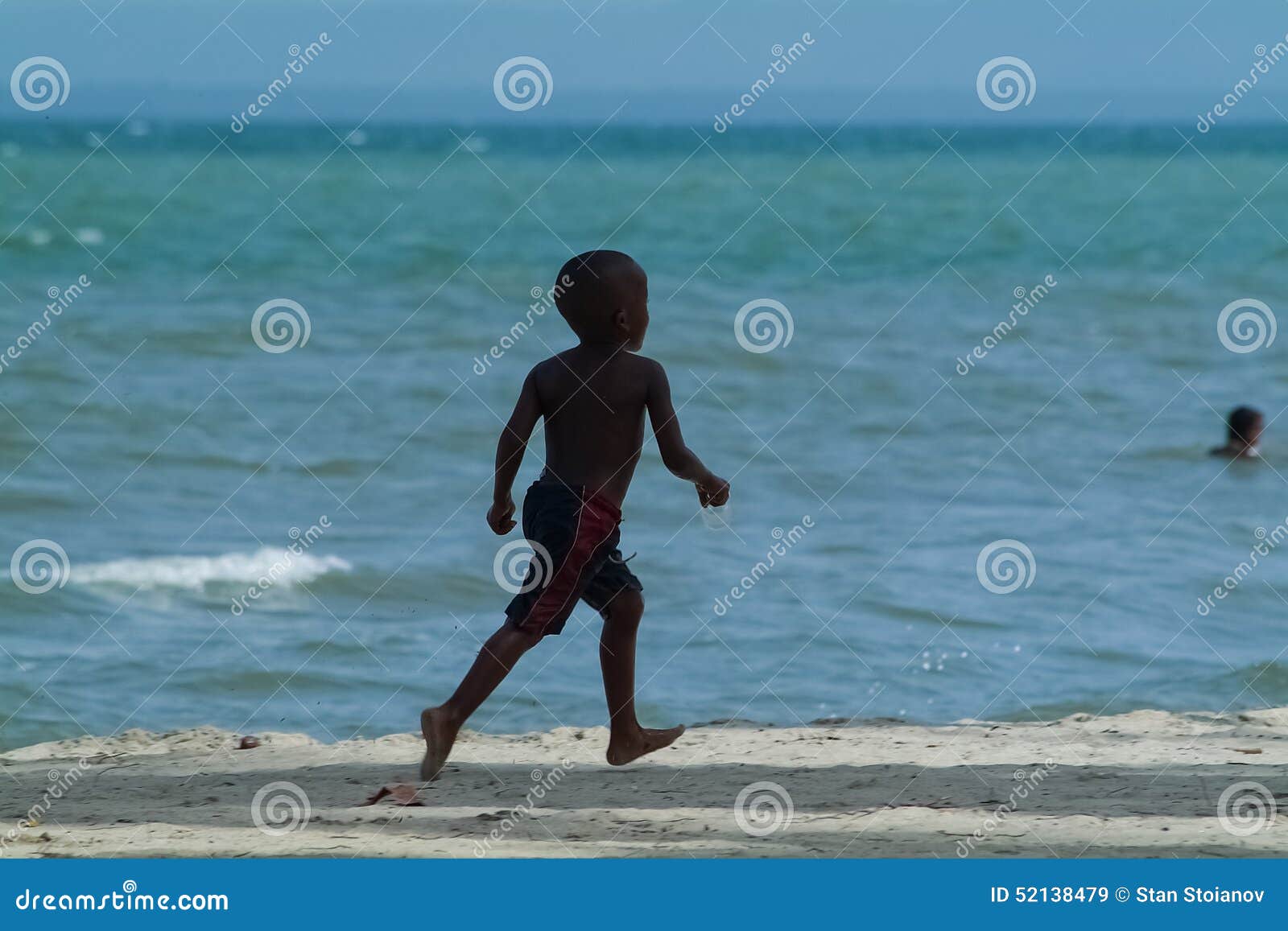 A Young Black Boy Running on Beach Editorial Stock Image - Image of ...