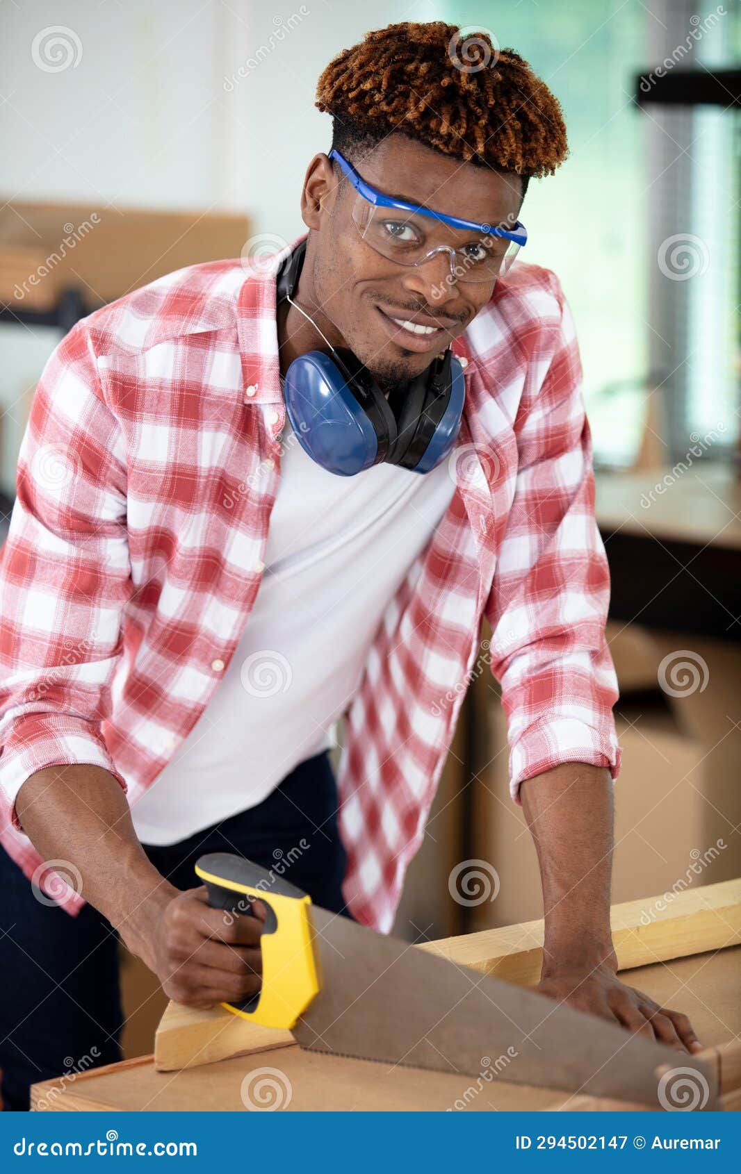Young Black Carpenter at Work Smiling Stock Image - Image of smile ...