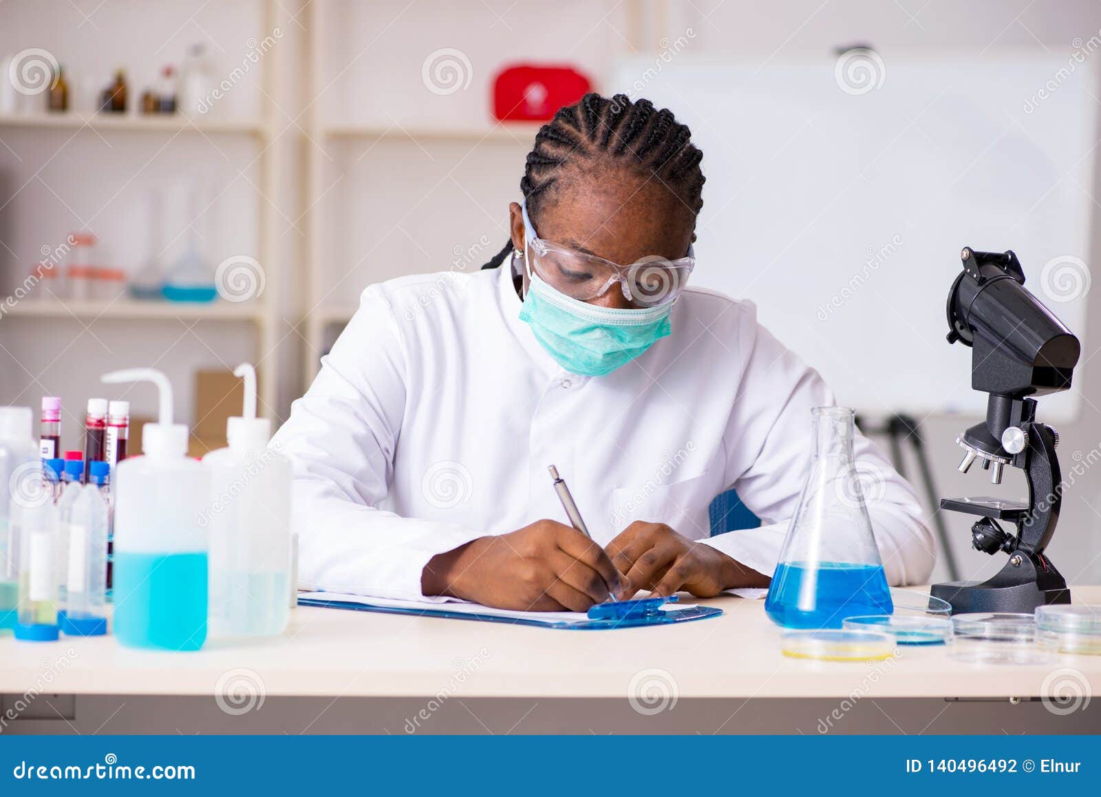 The Young Black Chemist Working in the Lab Stock Photo - Image of ...