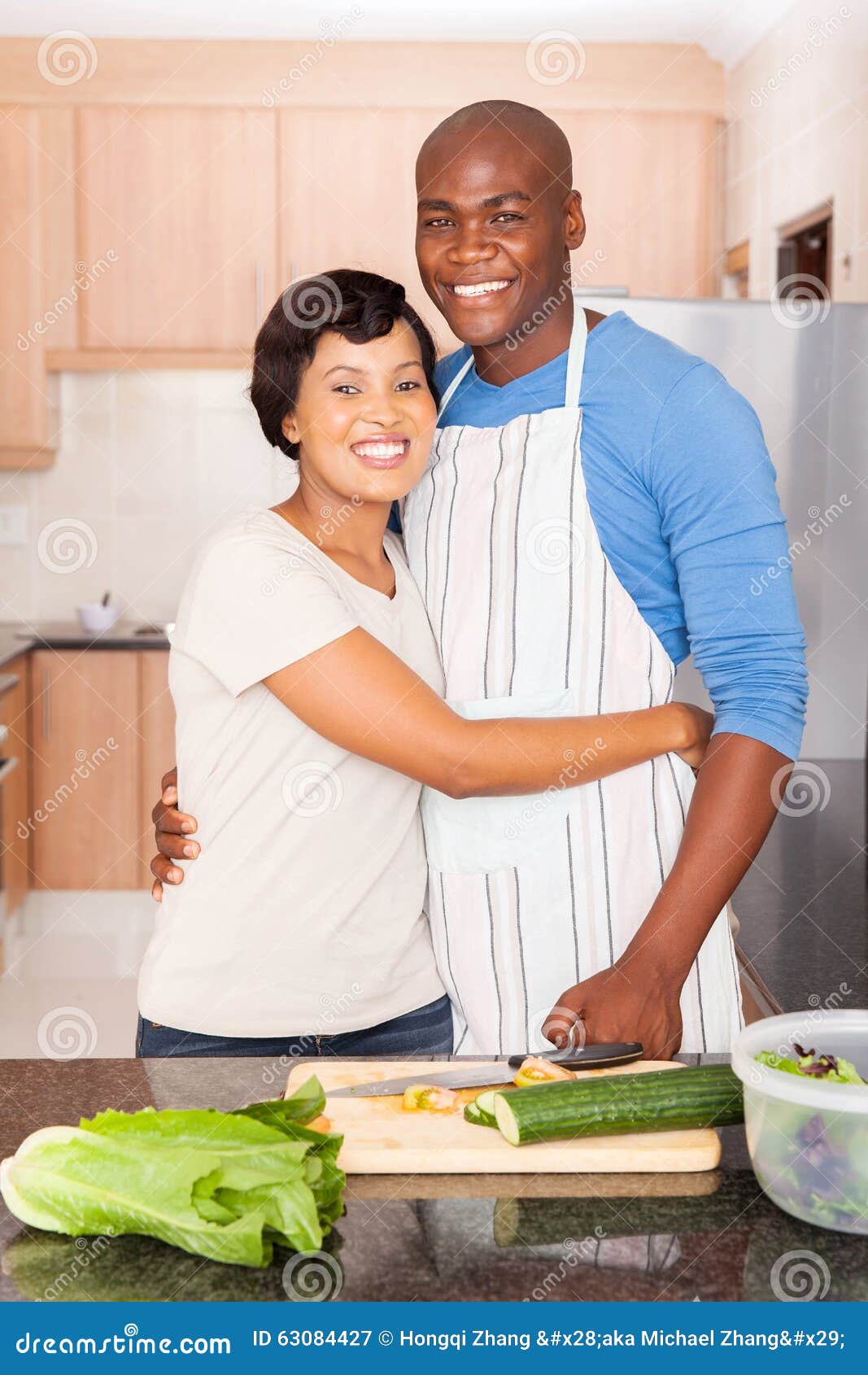 Young black couple cooking stock image. Image of girlfriend - 63084427