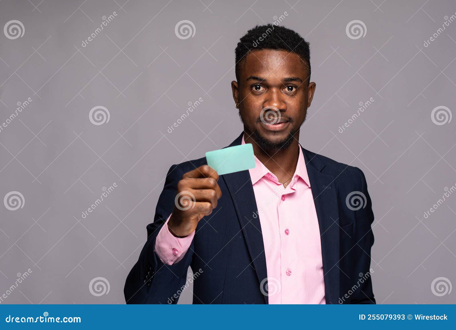 Young Black Man Holding a Card Stock Image - Image of corporate ...