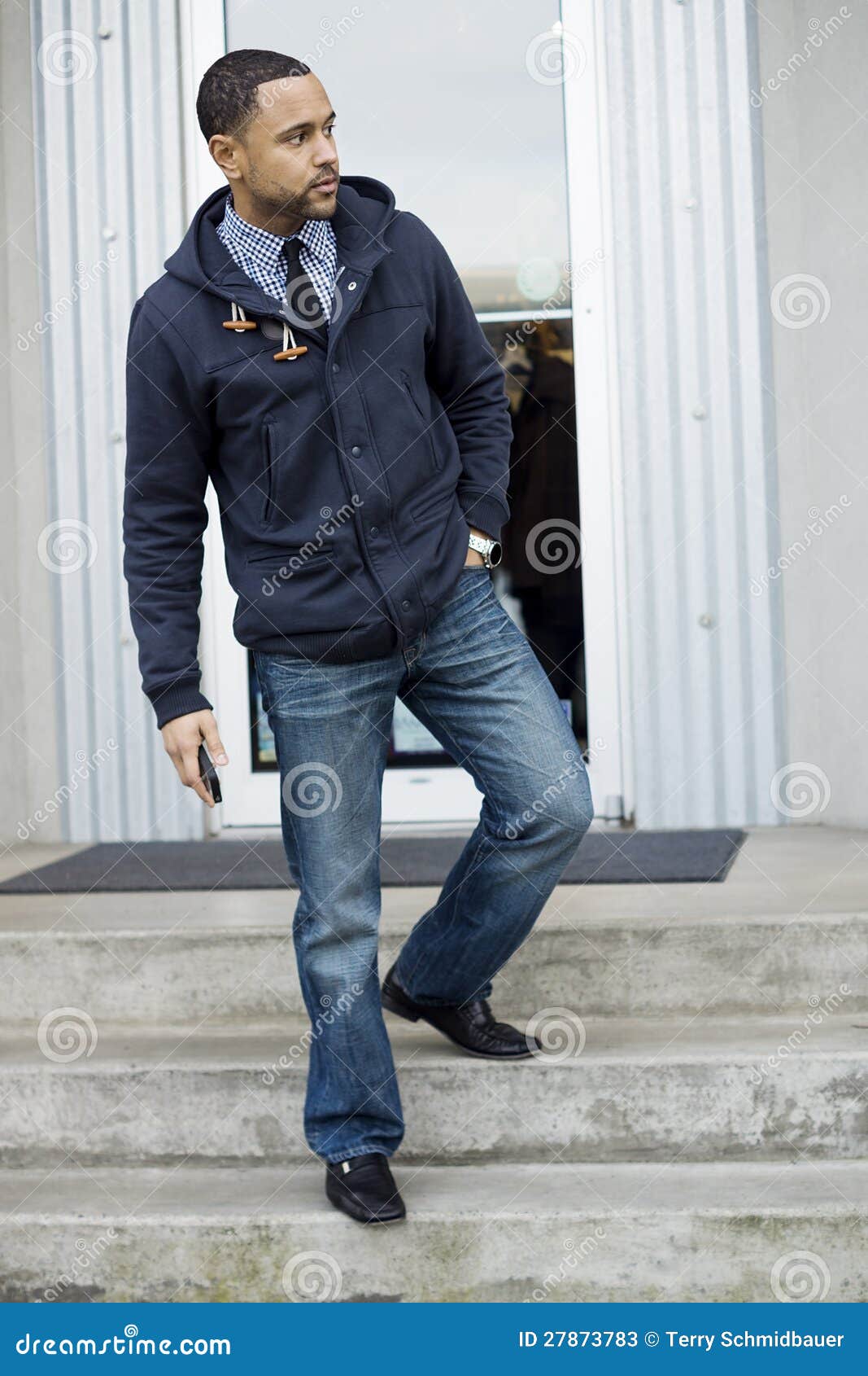Young Black Man Standing on Steps Looking Right Stock Image - Image of ...