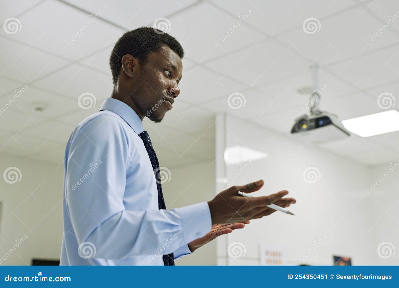 Young Black Man Teaching Class Stock Image - Image of candid, school ... Young Black Man Teaching Class Stock Image - Image of candid, school ...