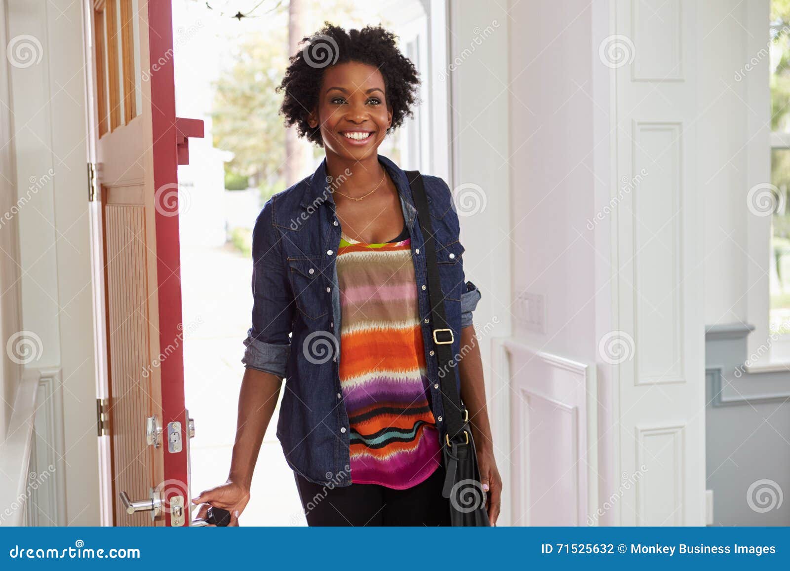 Young Black Woman Arriving Home Stock Photo - Image of camera ...