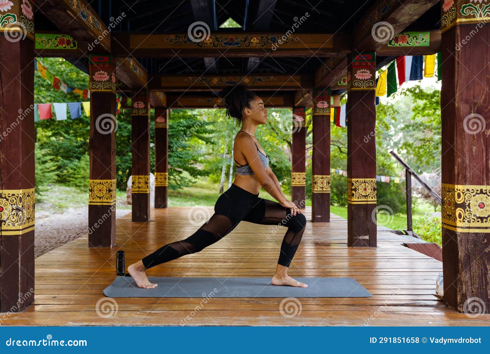 Young Black Woman Doing Exercise during Yoga Practice Stock Photo ...