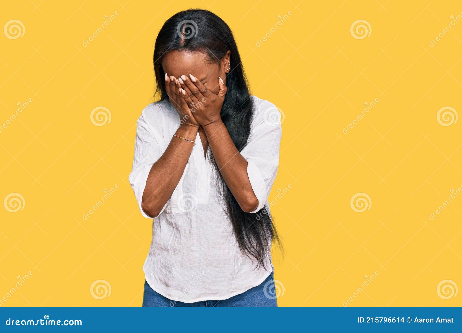 Young Black Woman Wearing Casual Clothes With Sad Expression Covering