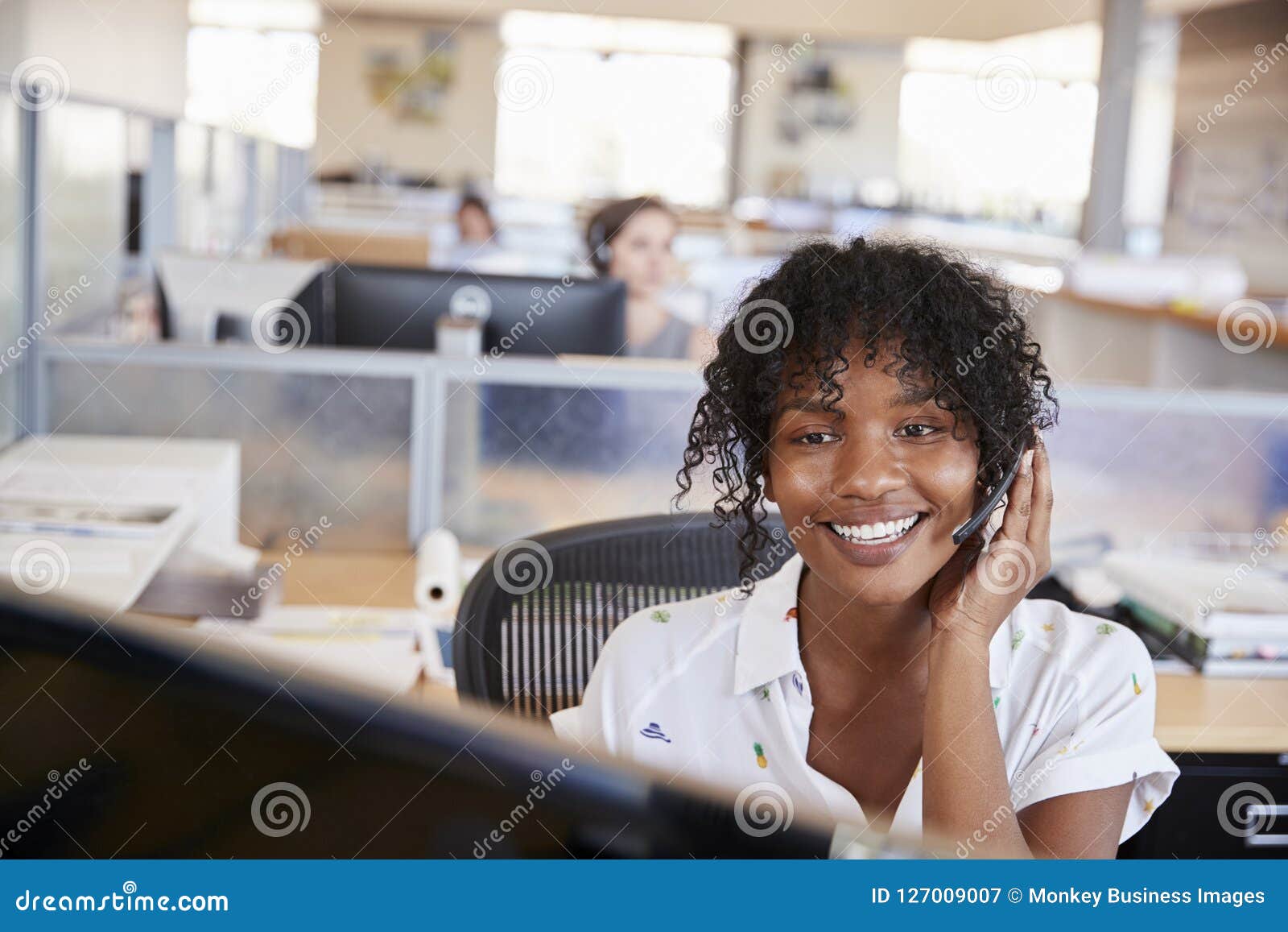 Young Black Woman Working in a Call Centre Stock Image - Image of ...