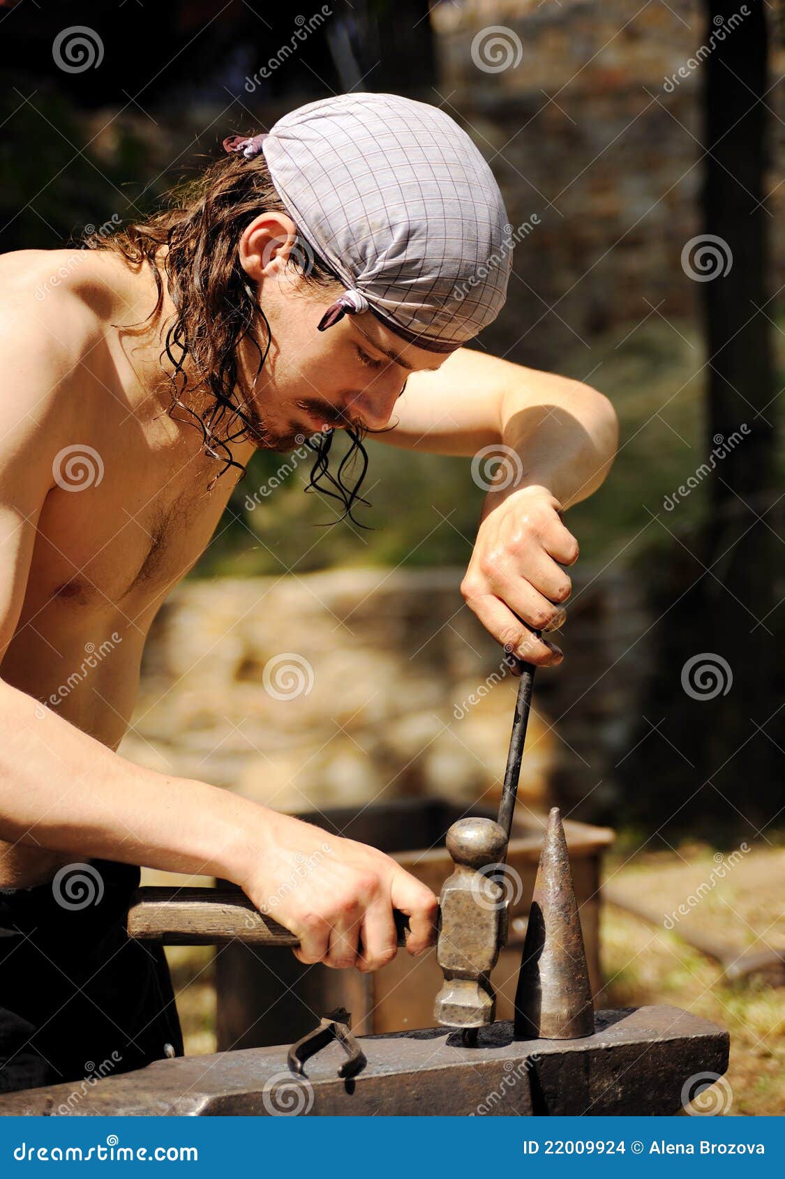 Young Blacksmith Hammering Hot Iron Stock Photo - Image of hard ...