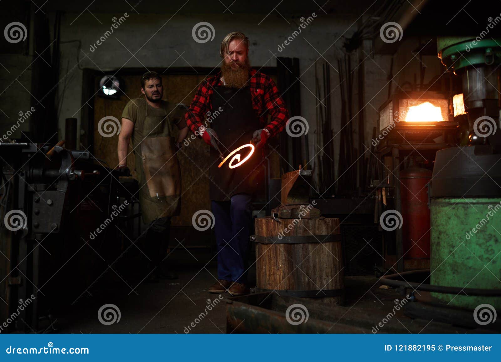 Teamwork in smithy stock image. Image of blacksmith - 121882195
