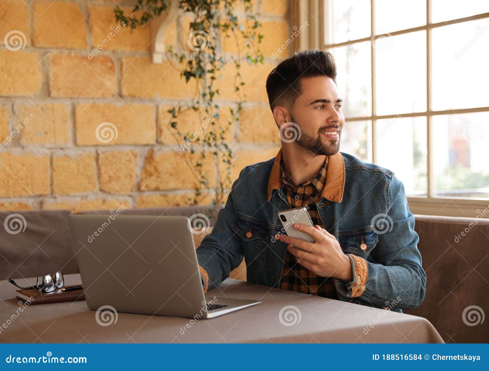 Blogger with Laptop and Phone at Table in Cafe Stock Photo - Image of ...