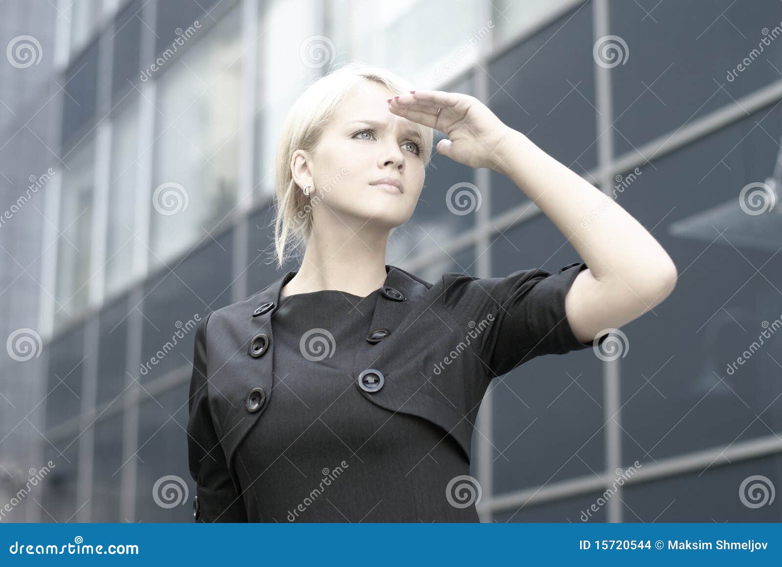 A Young Blond Businesswoman is Looking Forward Stock Photo - Image of ...