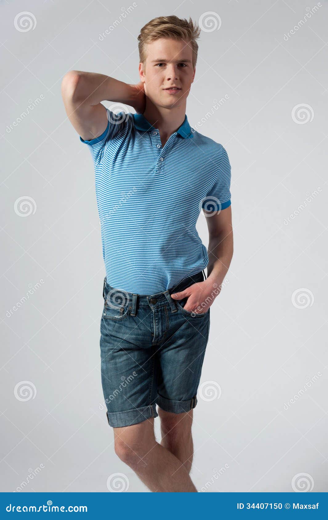 Young Blond Man in Blue Shirt Stock Photo - Image of posing, studio ...