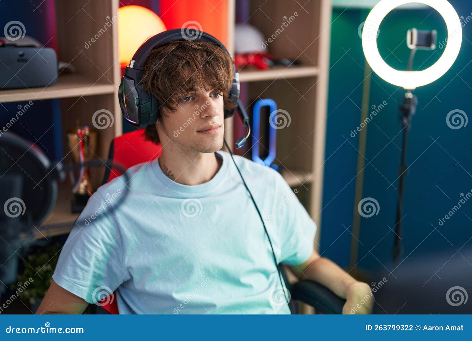 Young Blond Man Playing Video Game Using Computer at Gaming Room Stock ...