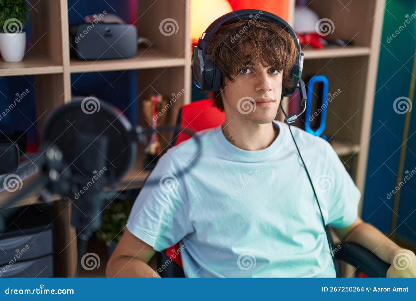Young Blond Man Playing Video Game Using Computer at Gaming Room Stock ...