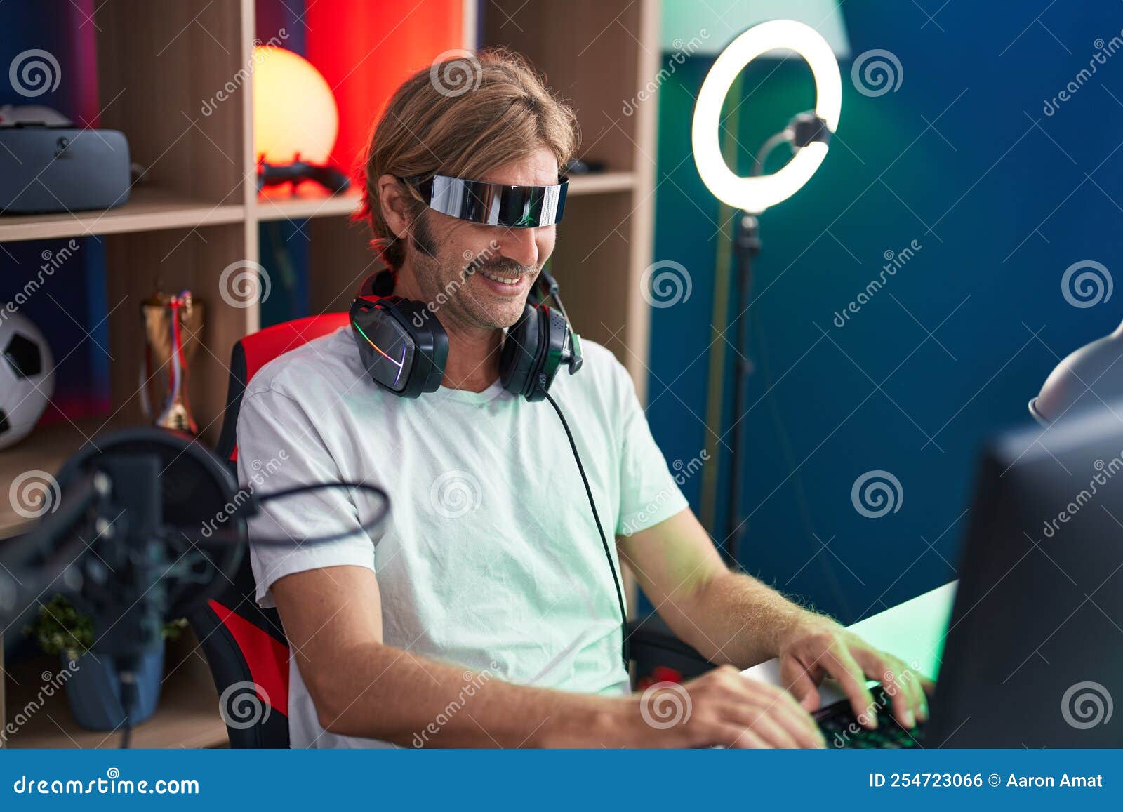 Young Blond Man Streamer Playing Video Game Using Virtual Reality ...