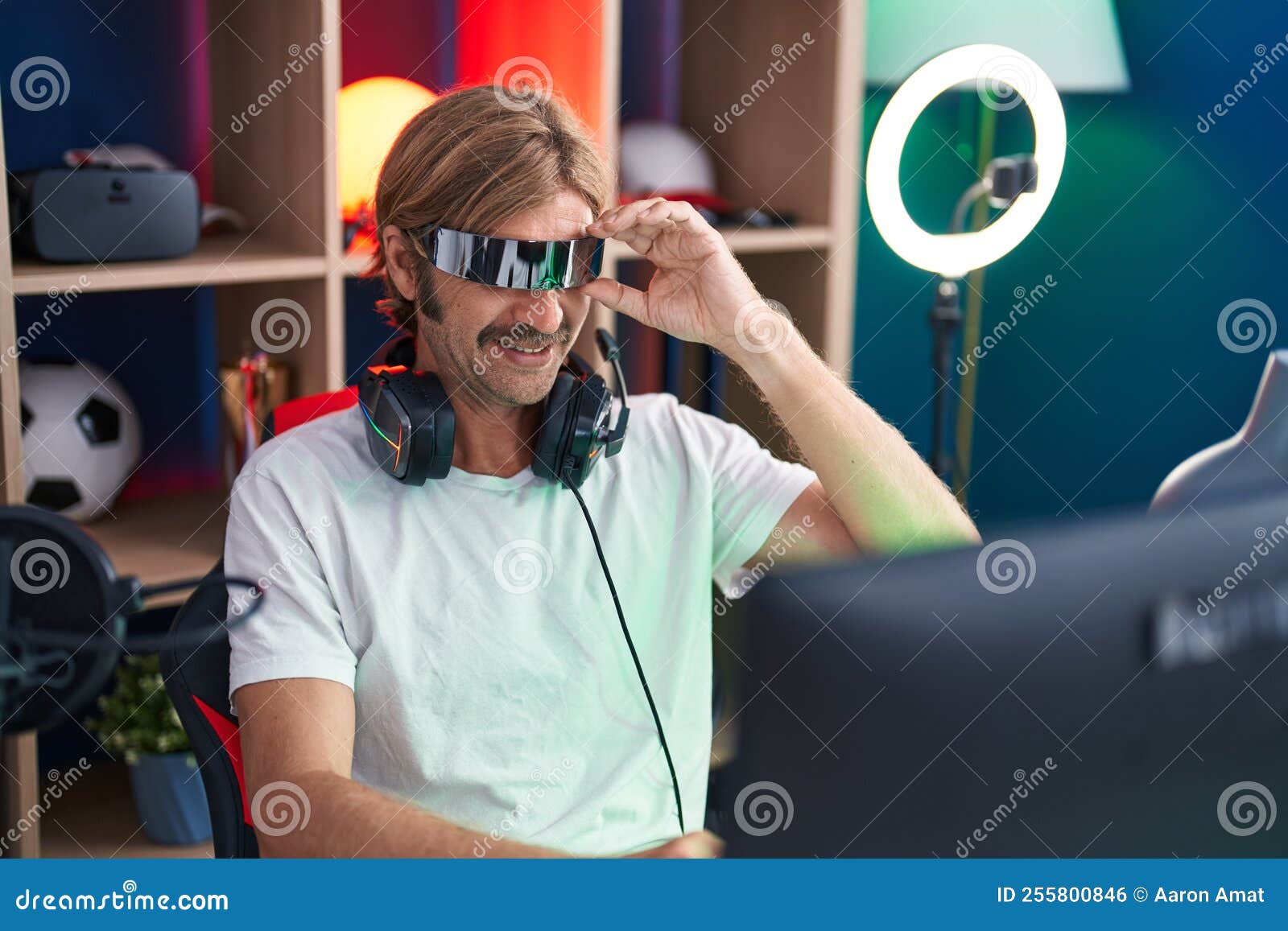 Young Blond Man Streamer Playing Video Game Using Virtual Reality ...