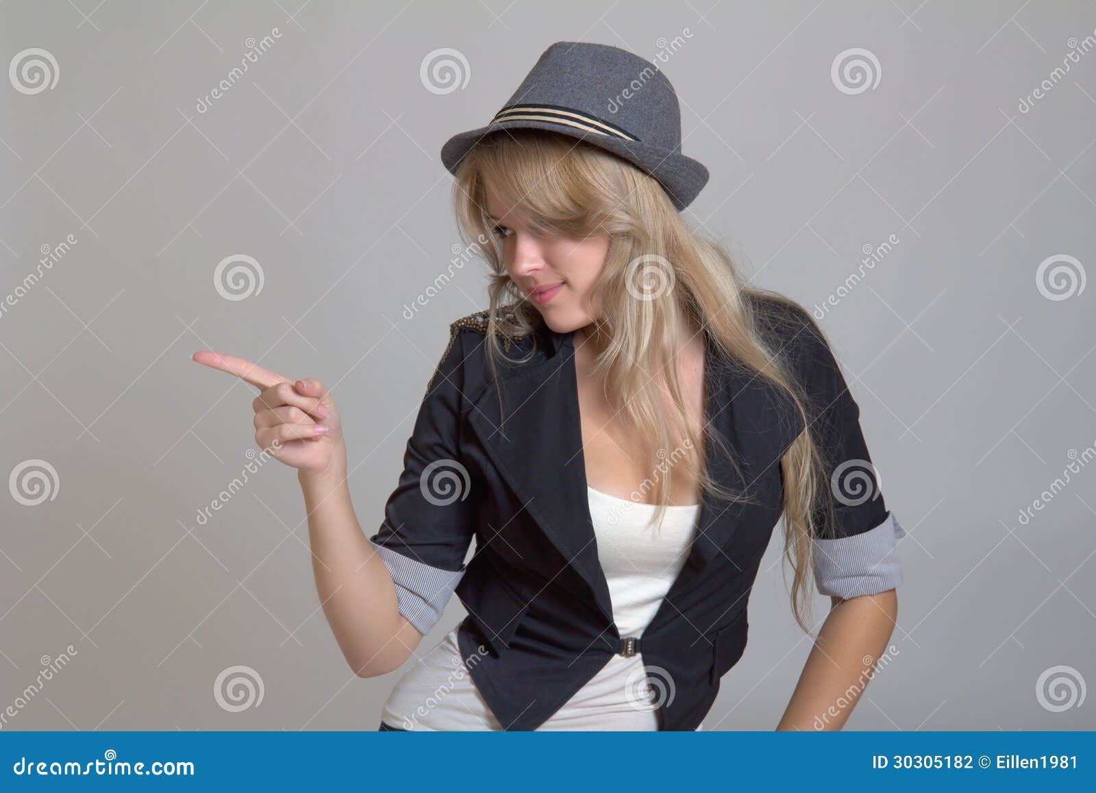 Young Woman in Hat Pointing Stock Photo - Image of hand, hair: 30305182