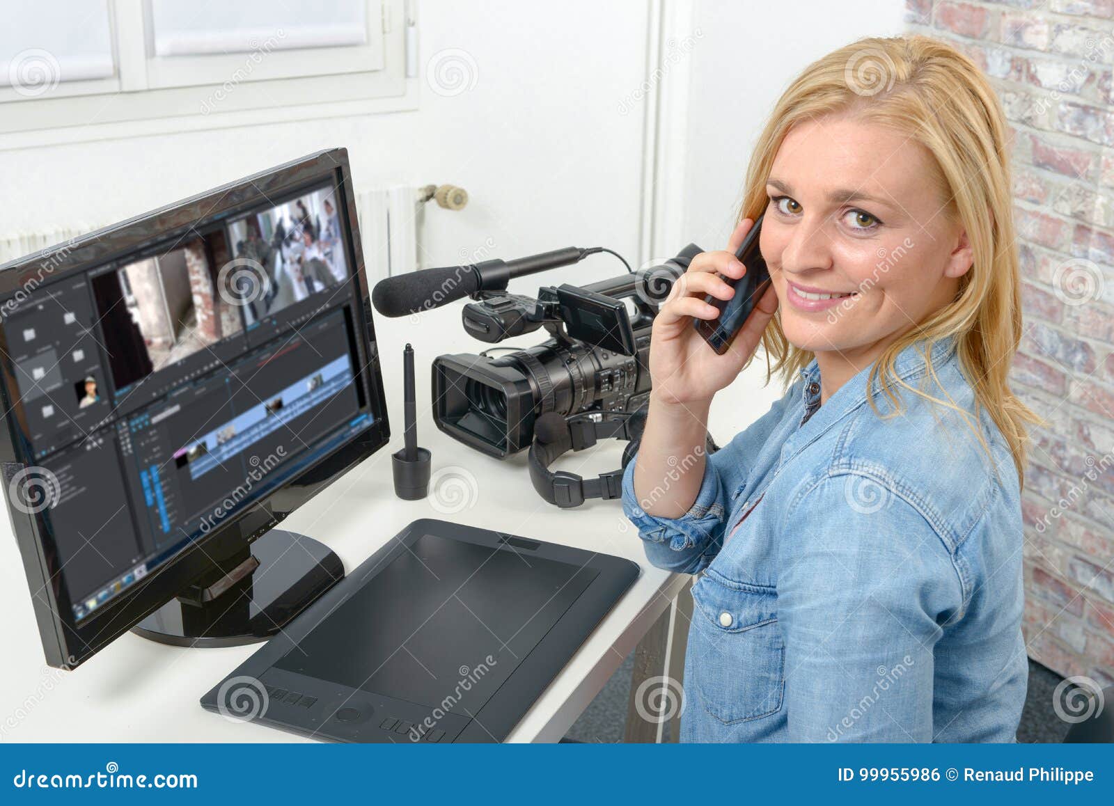 Young Woman Designer Using Computer for the Video Editing Stock Photo ...