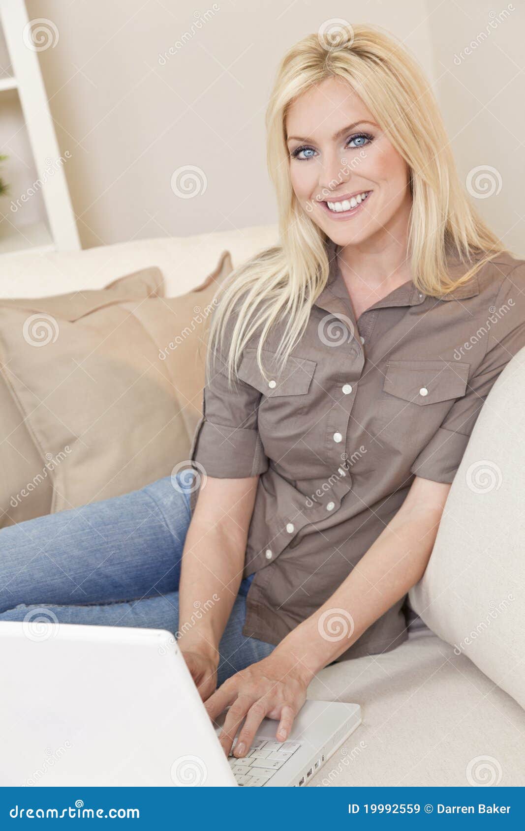 Young Blond Woman Using Laptop Computer at Home Stock Image - Image of ...